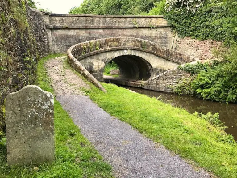 Stone-built Snake Bridge on the Macclesfield Canal, England